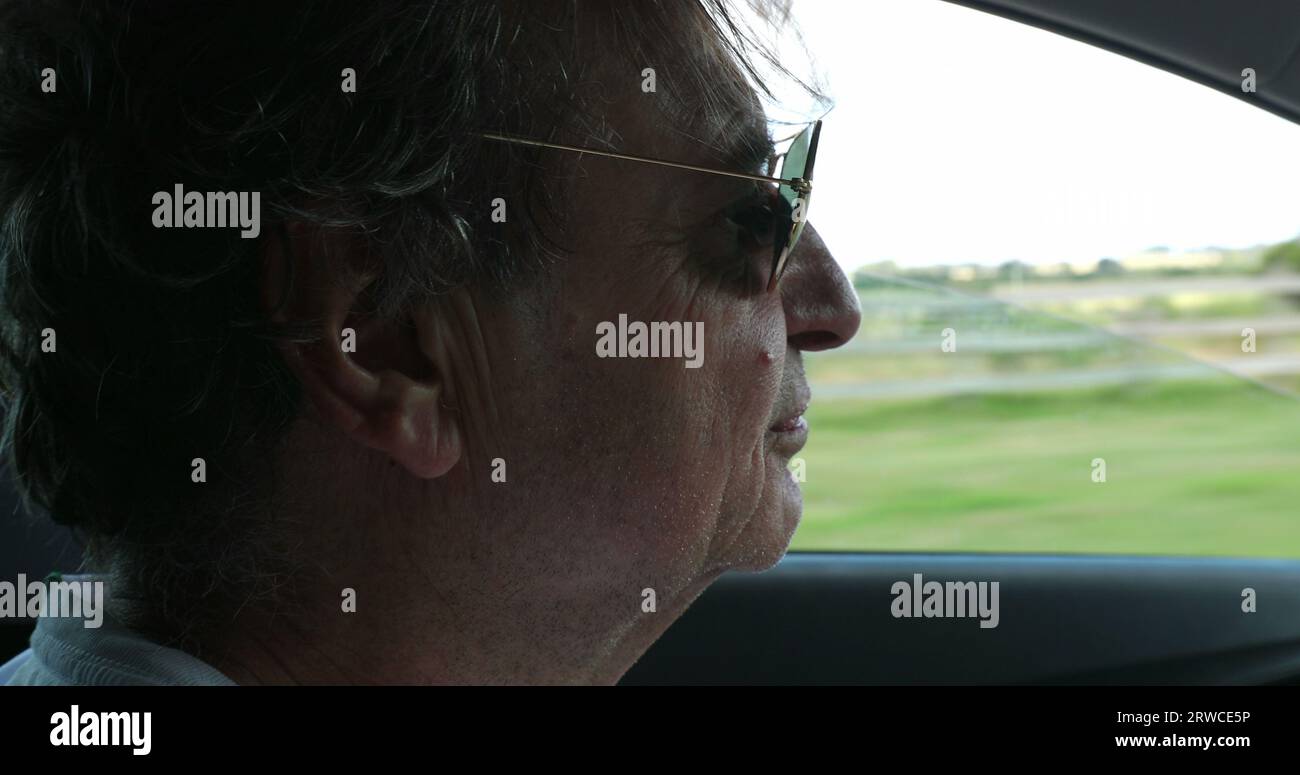 Older man driving car wearing hi-res stock photography and images - Alamy