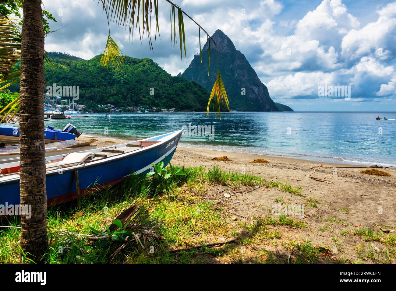 Beach, fishing boats and The Pitons in Saint Lucia, UNESCO World ...