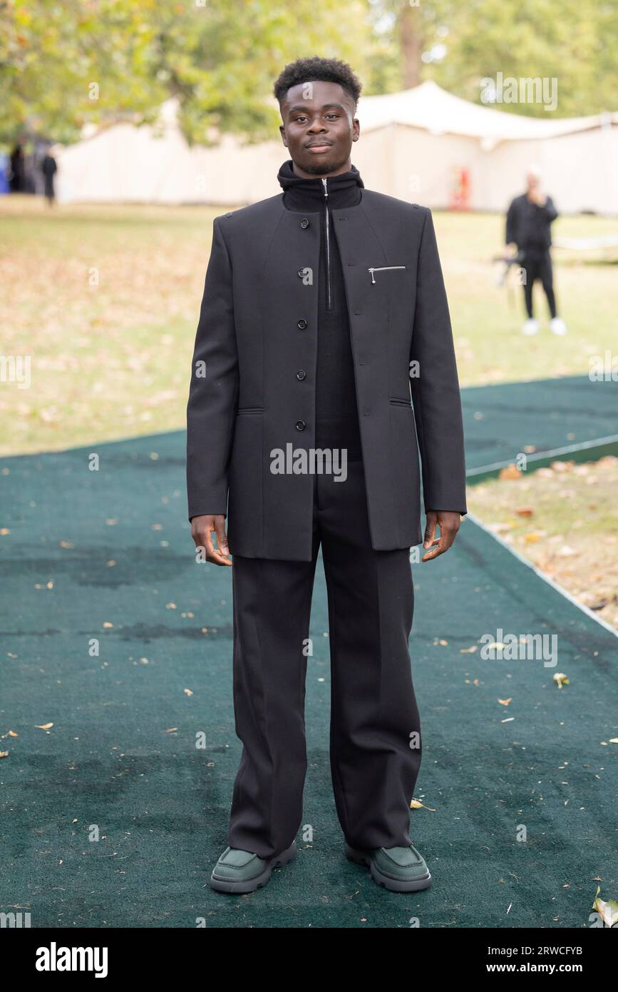 Bukayo Saka poses for photographers upon arrival at the Burberry Spring ...