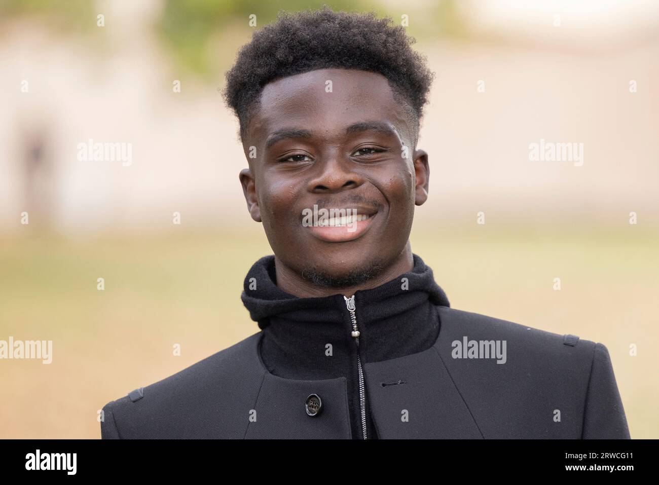 Bukayo Saka poses for photographers upon arrival at the Burberry Spring ...