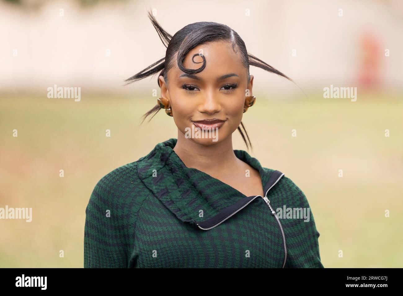 Temi Otedola poses for photographers upon arrival at the Burberry ...