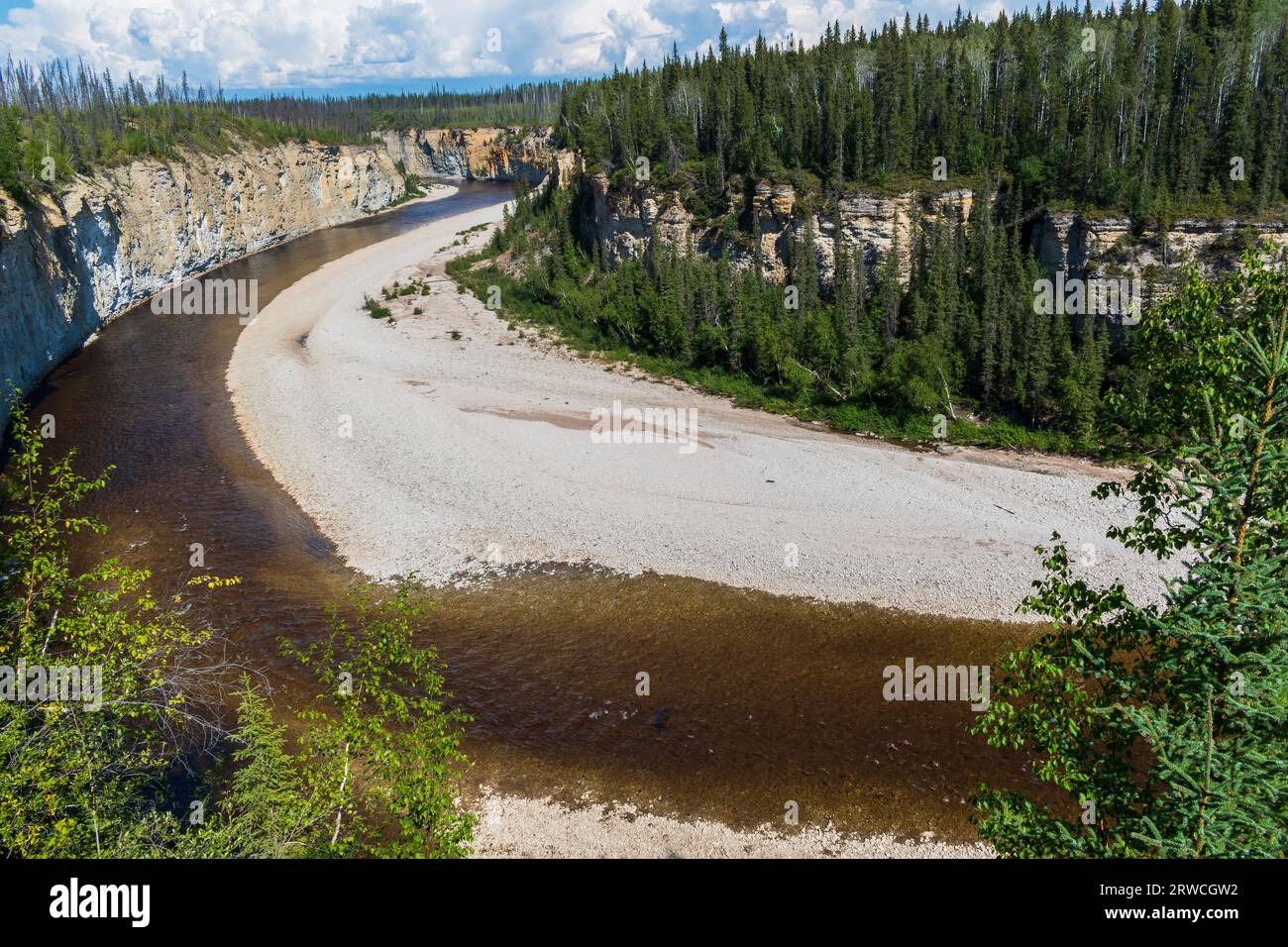 A Beautiful Summer Scenes as the Trout River Cuts Through the Boreal ...