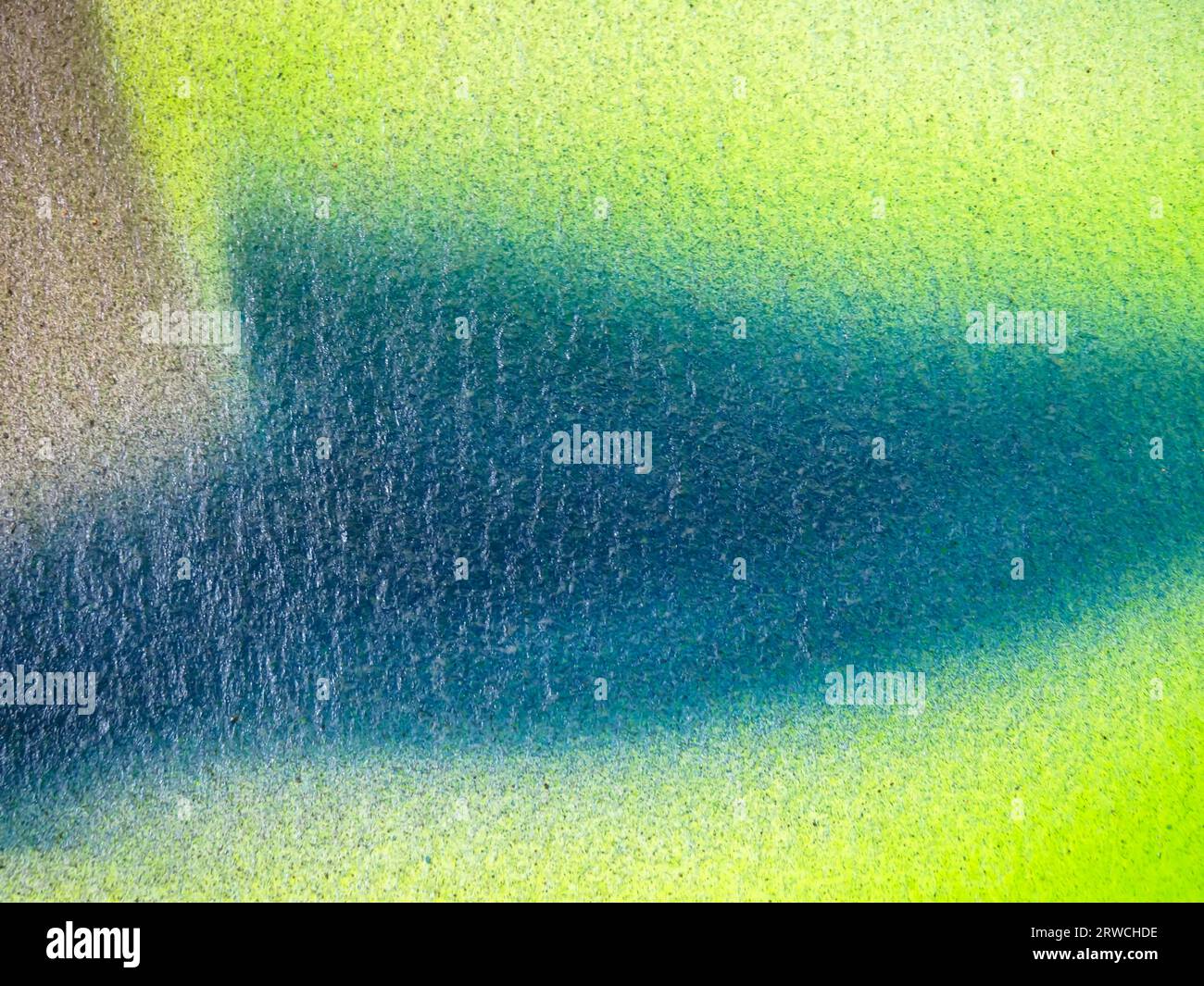 texture of rough wall surface, plaster painted with colorful paints ...