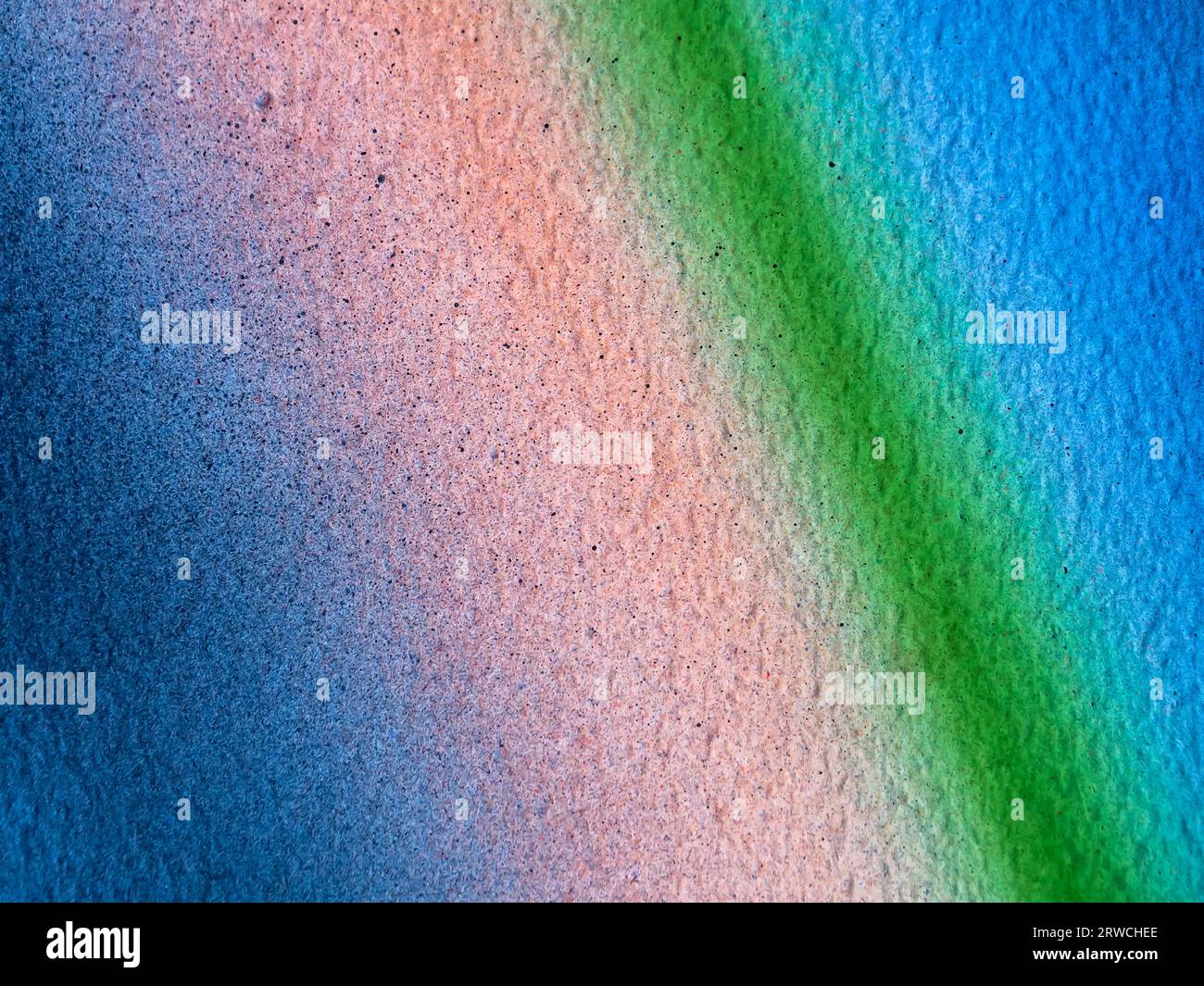 texture of rough wall surface, plaster painted with colorful paints ...