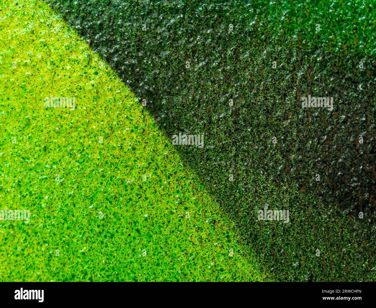 texture of rough wall surface, plaster painted with colorful paints ...