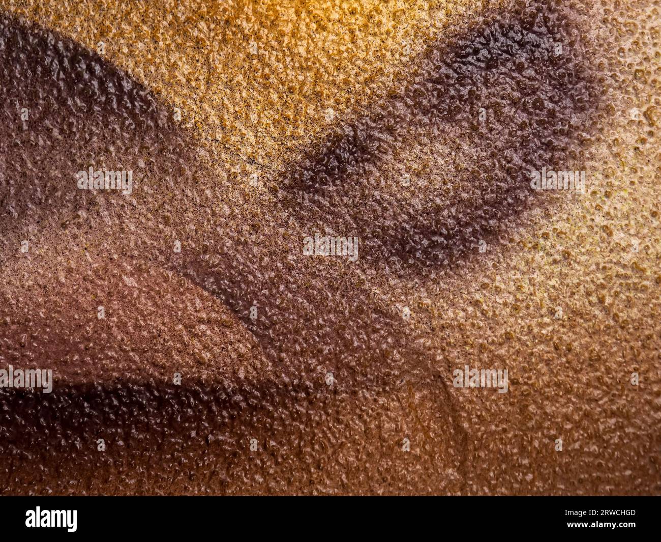 texture of rough wall surface, plaster painted with colorful paints ...