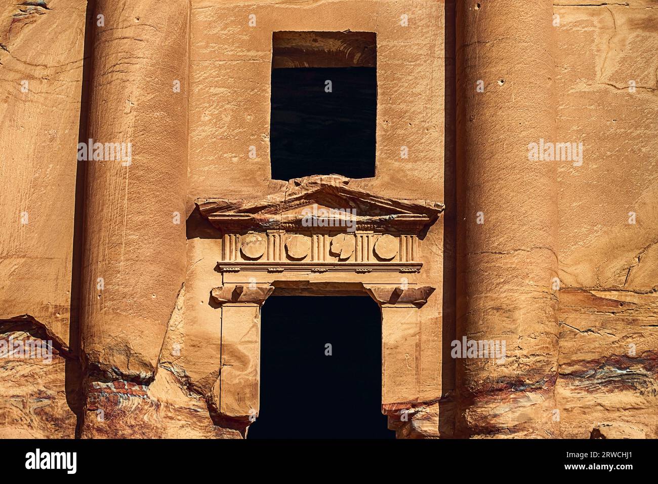View of the temple and building carved into the sandstone rock. Petra ...