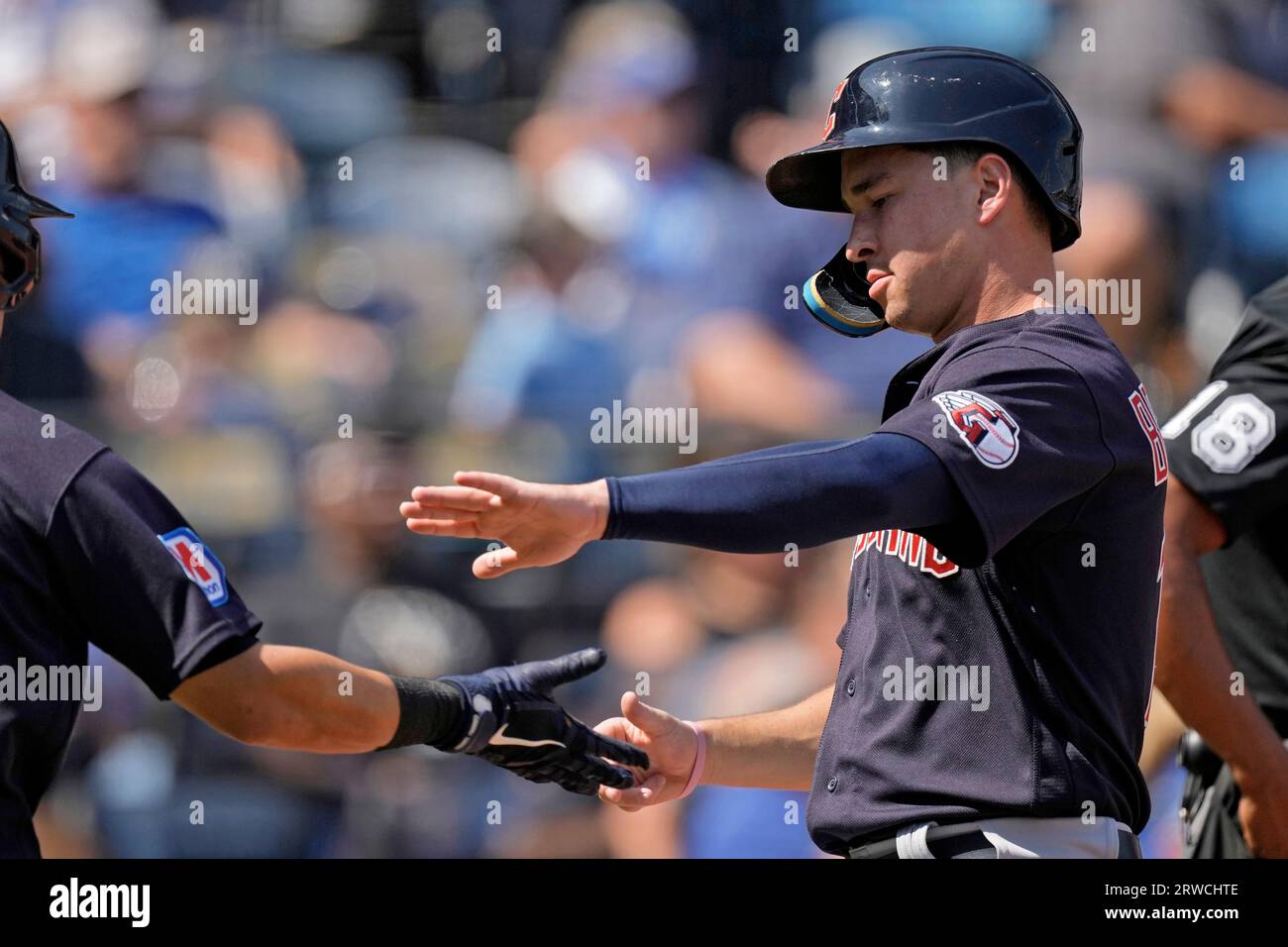 Cleveland Guardians' Will Brennan, right, celebrates with Steven Kwan ...