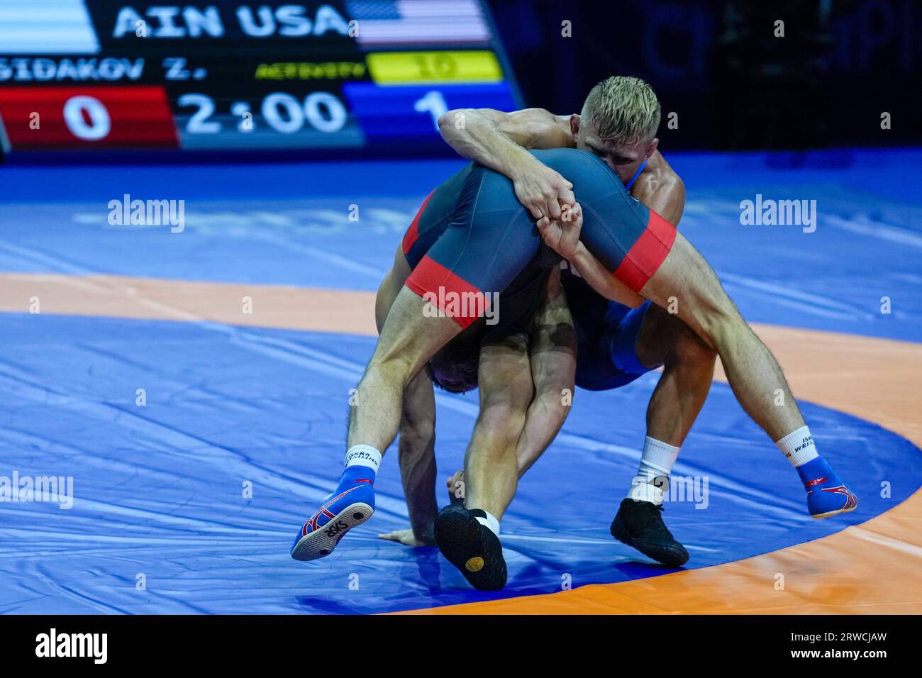 Zaurbek Sidakov of Russia, front, and Kyle Douglas Dake of US compete ...