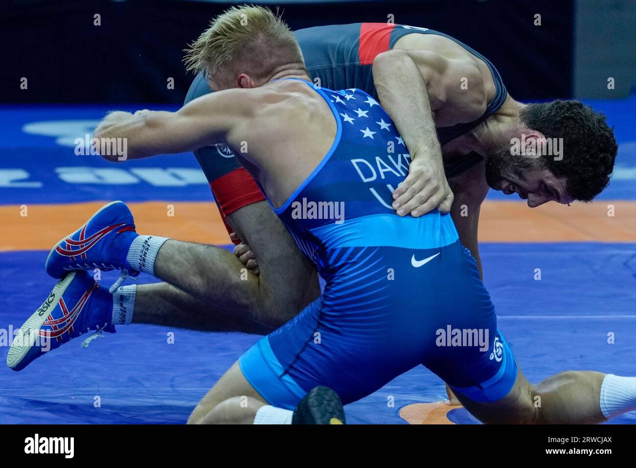 Zaurbek Sidakov of Russia, top, and Kyle Douglas Dake of US compete in ...
