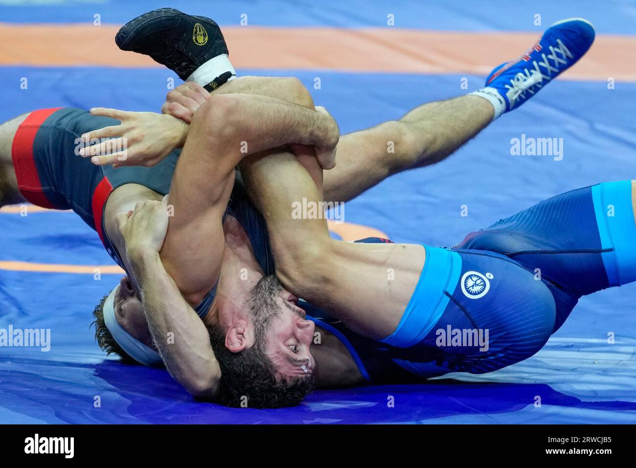 Zaurbek Sidakov of Russia, left,, and Kyle Douglas Dake of US compete ...