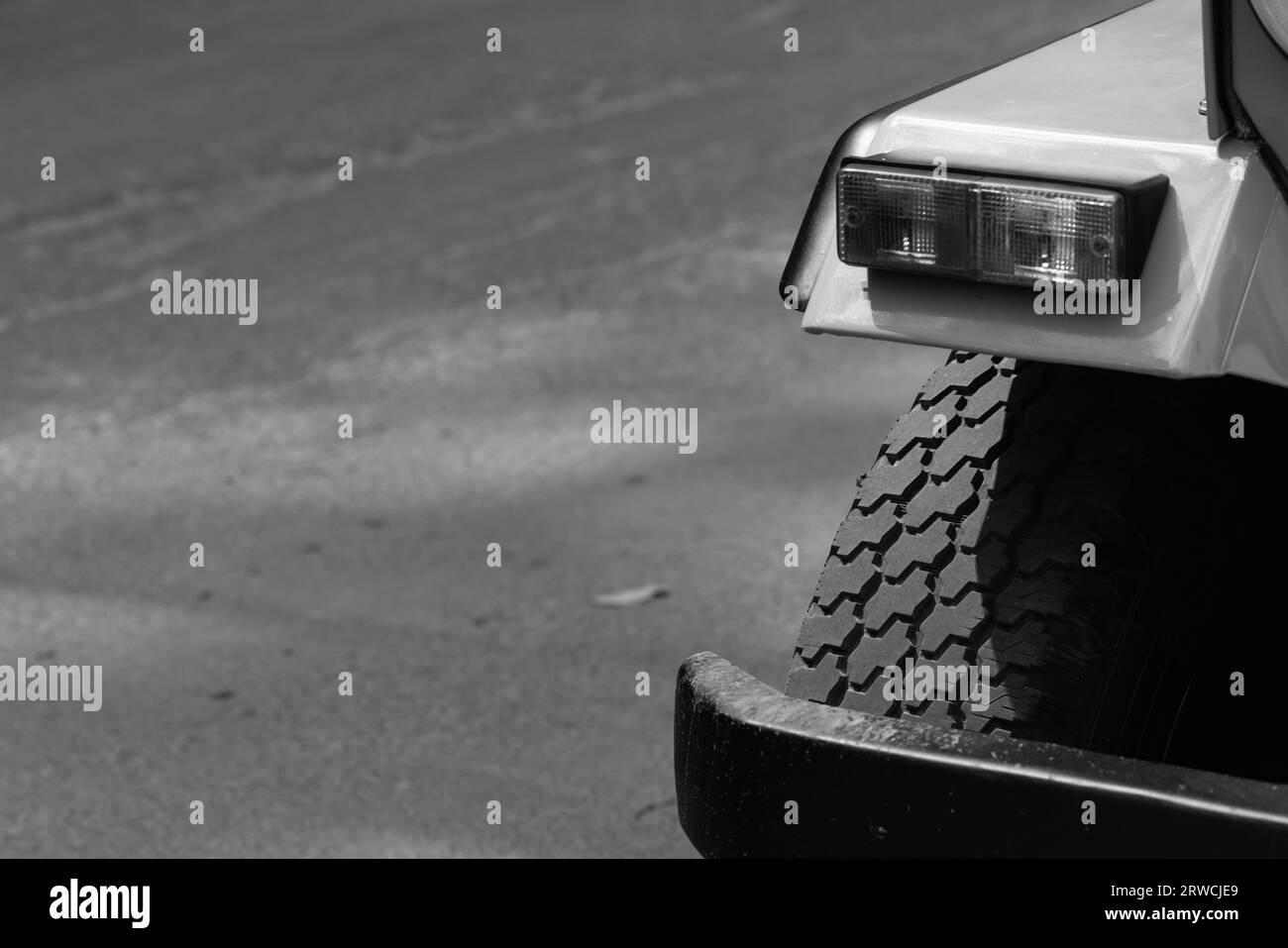 Pickup car are stopped on a dirt road. Off-road truck car wheels ...