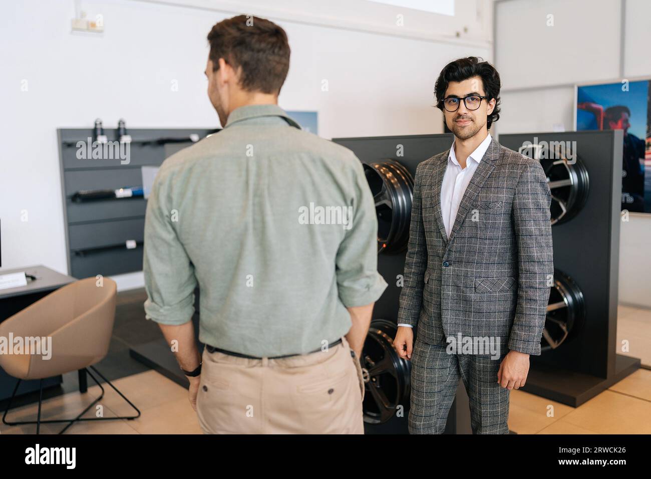 Professional salesman manager in business suit talking about ...