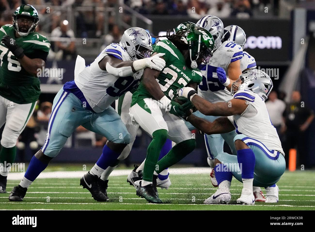 Dallas Cowboys linebacker Micah Parsons (11) strips the ball away from ...