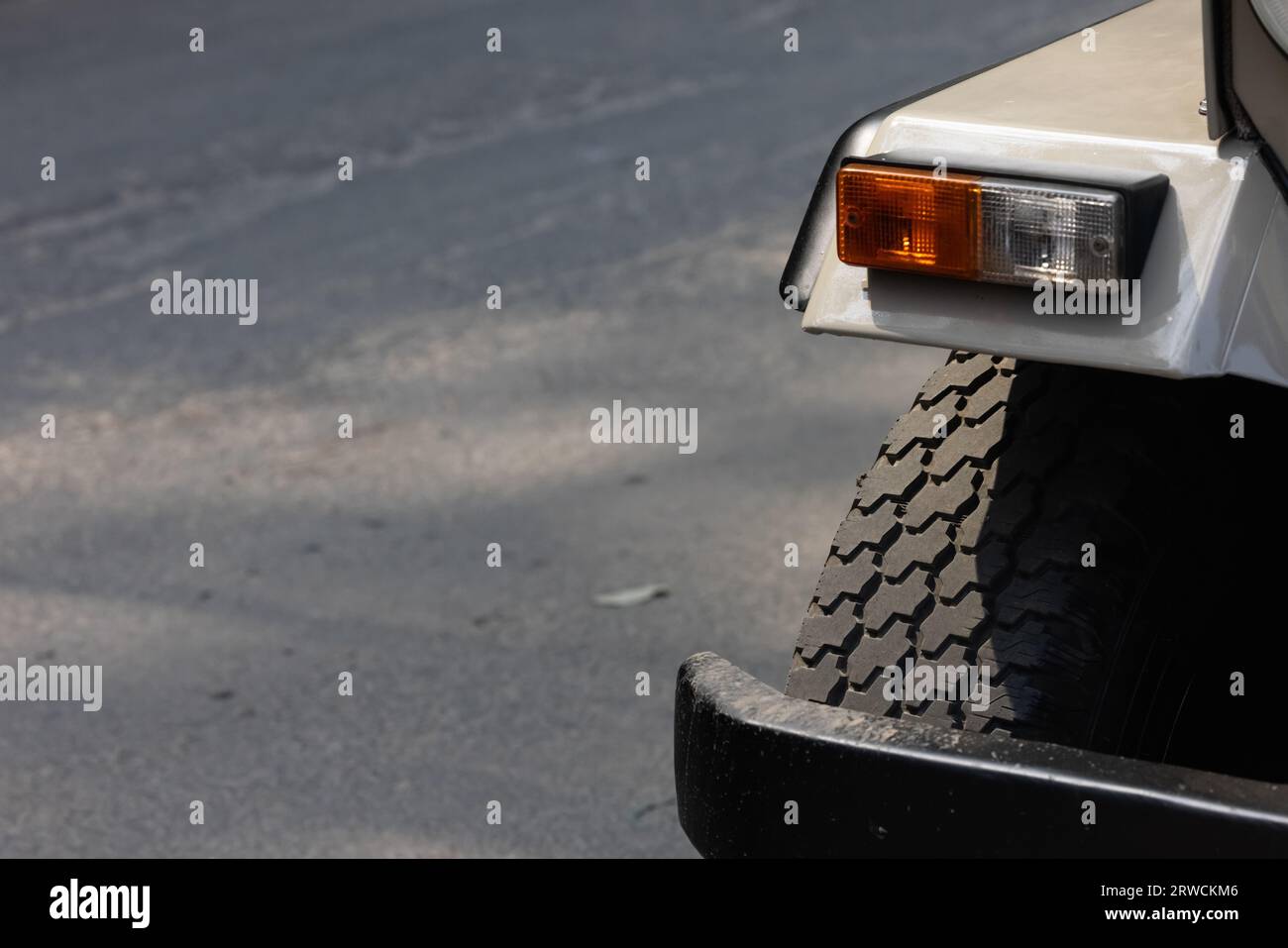 Pickup car are stopped on a dirt road. Off-road truck car wheels ...