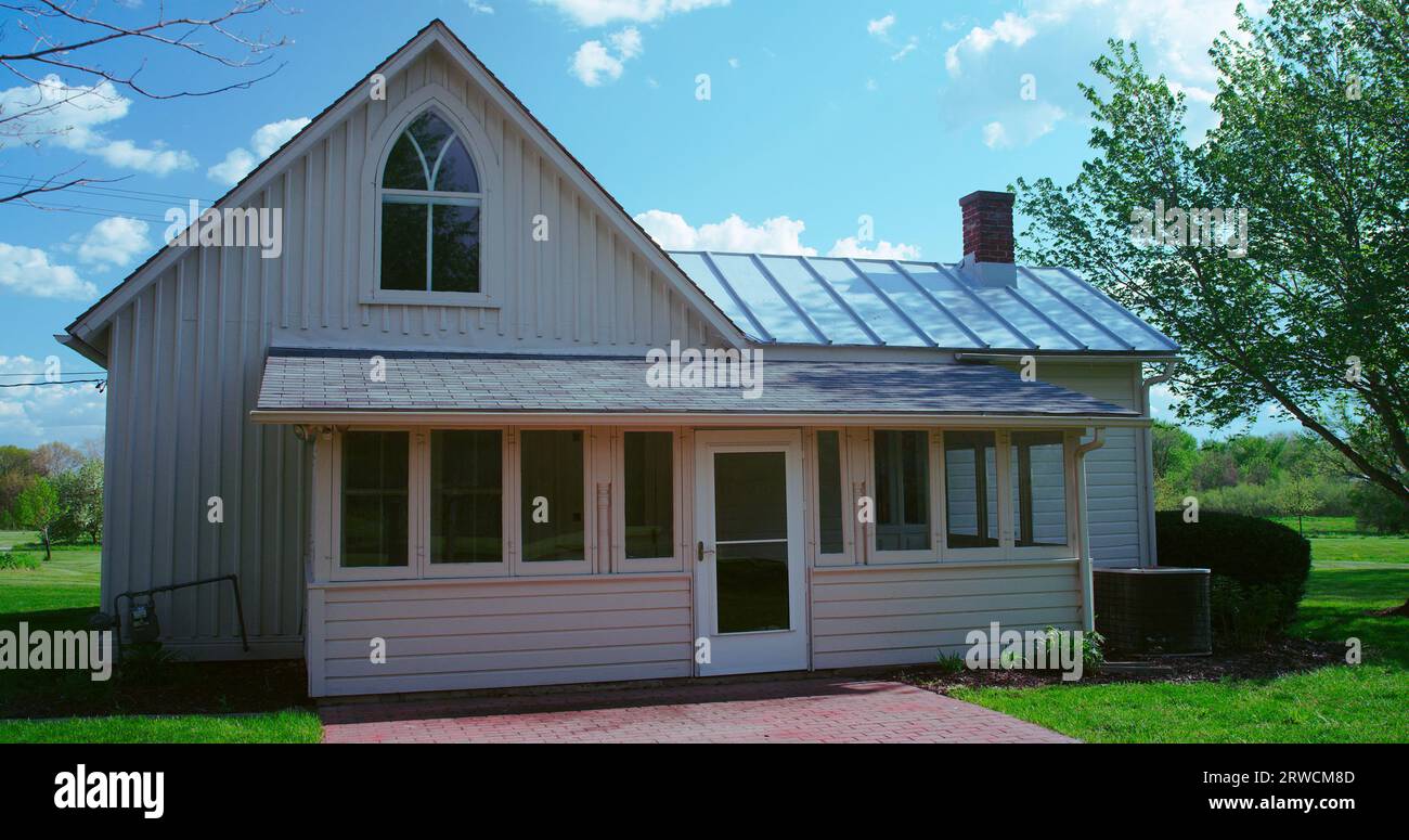 Backside of the iconic American Gothic house. Made famous by artist ...