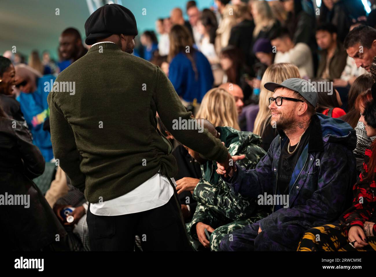 Skepta, left, greets Damon Albarn as they attend the Burberry Spring ...