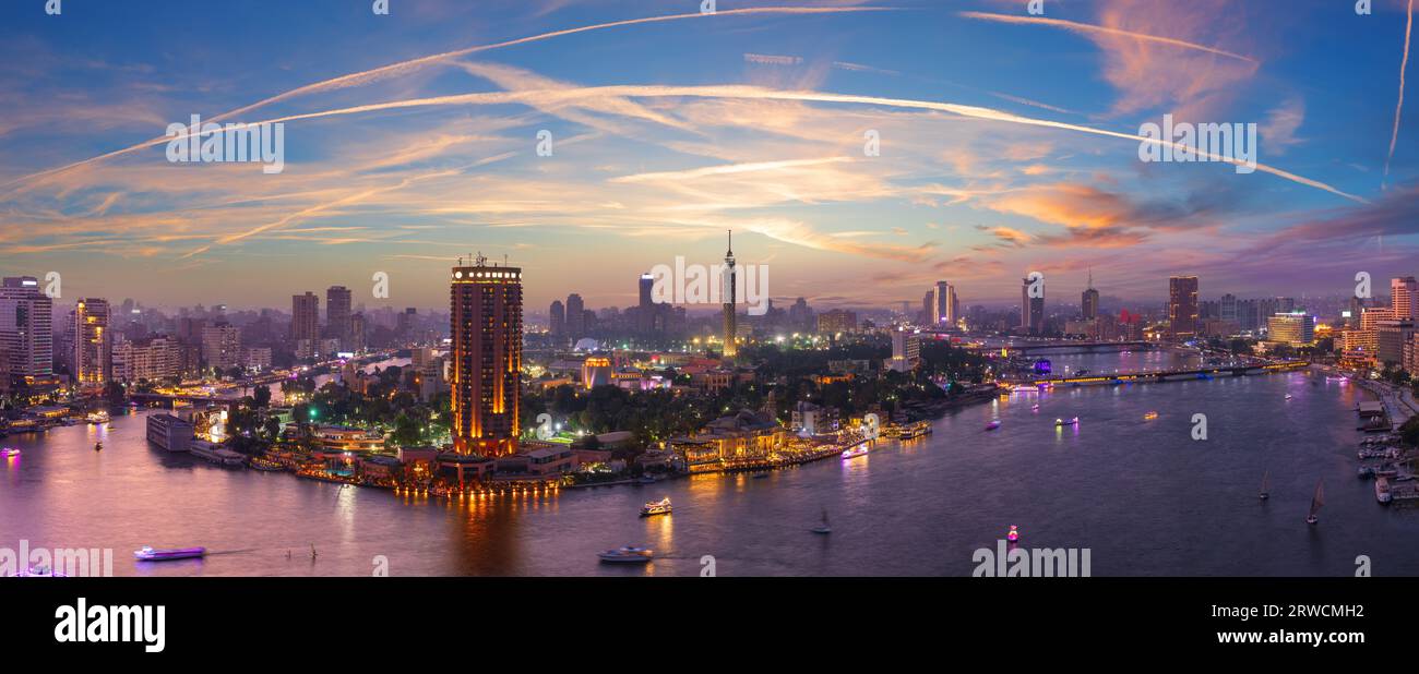 Wonderful purple sunset panorama of the Nile and Gezira island in Cairo ...