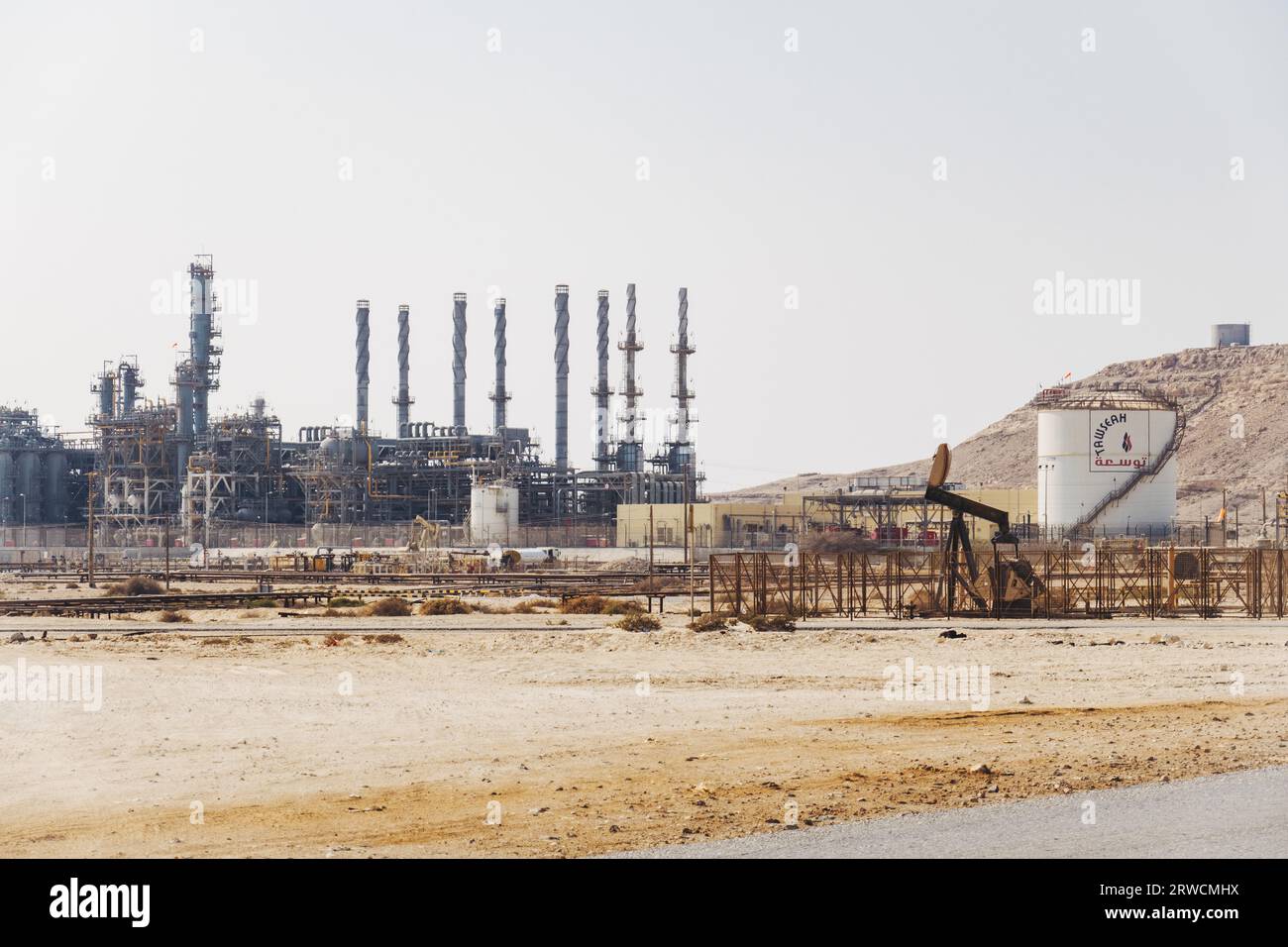 natural gas pipelines, storage tanks and processing units in the desert ...