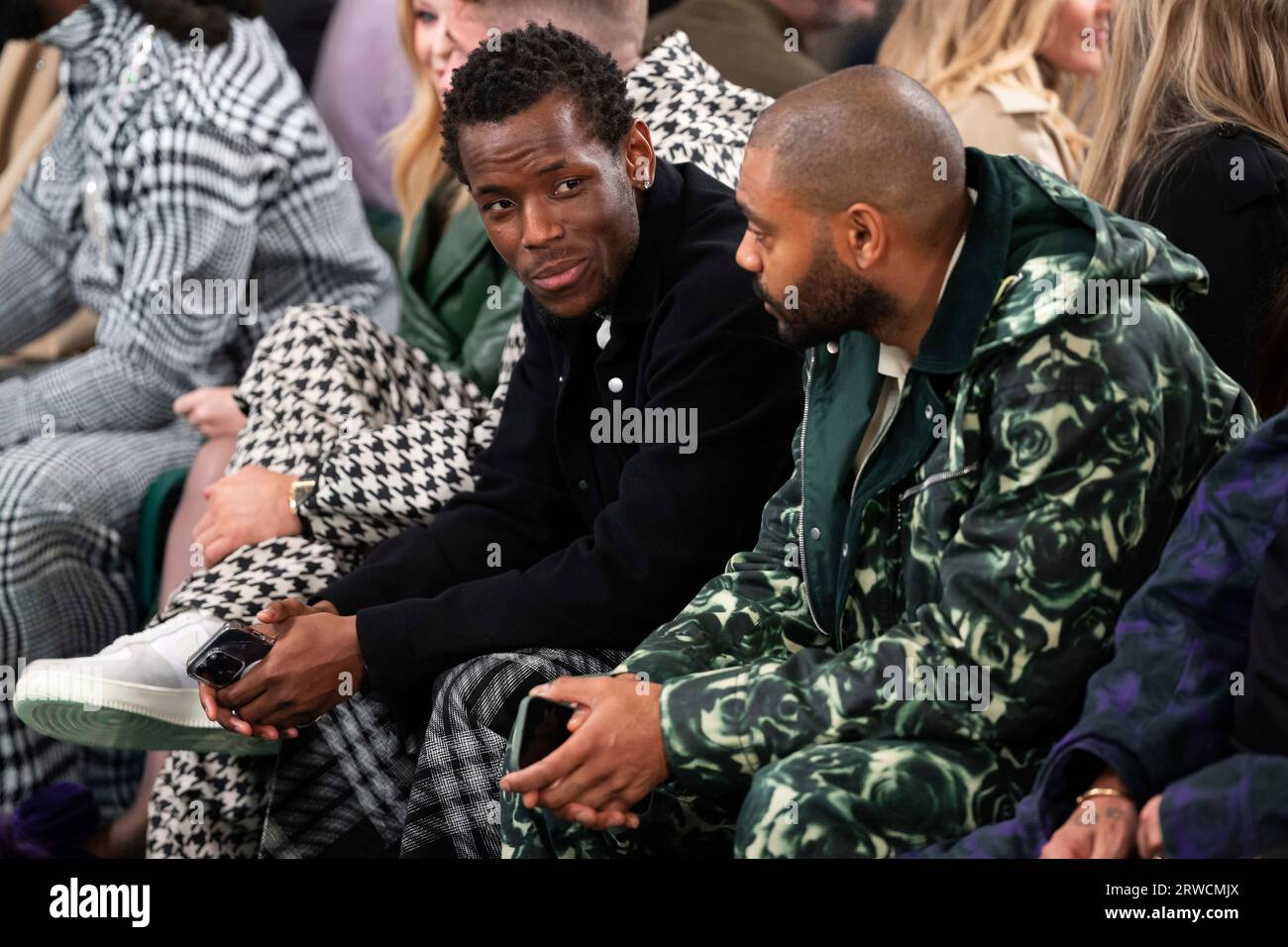 Micheal Ward, left, and Kano attend the Burberry Spring Summer 2024 ...