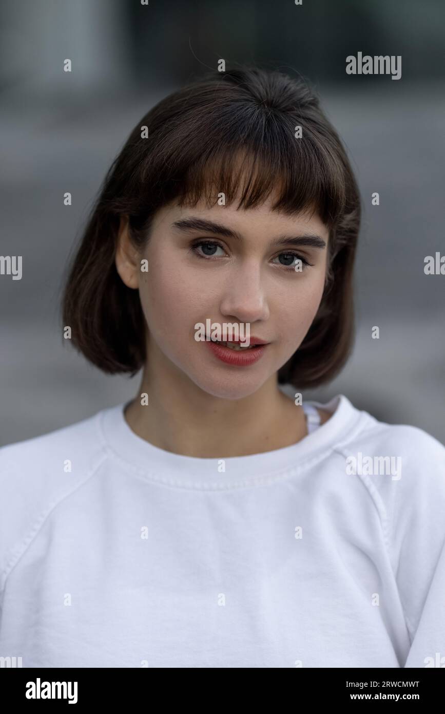 Model with perfect long glossy brown hair. Close-up Bob haircut ...