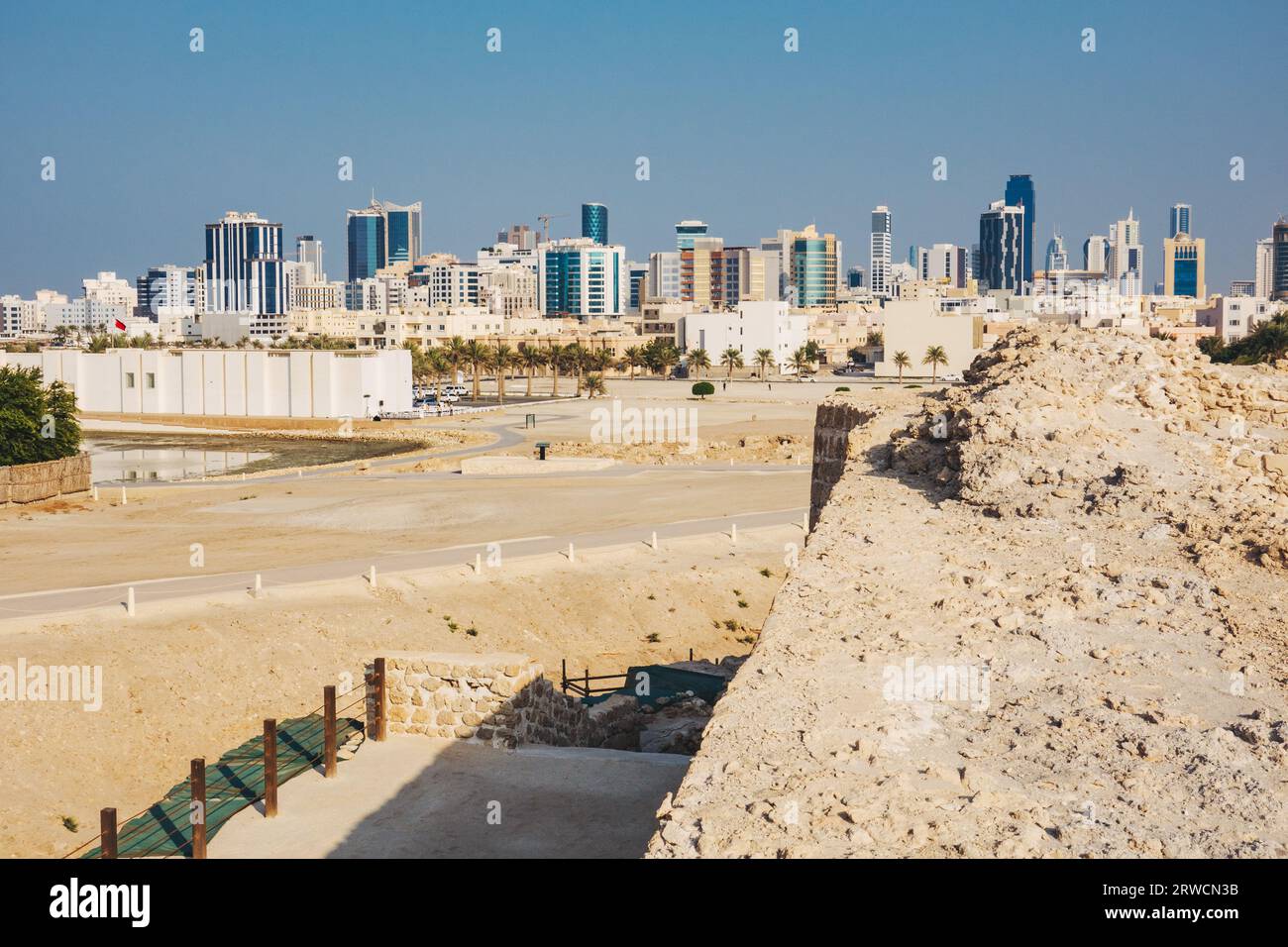 Old and new: the stone wall ruins of Bahrain Fort, dating back to 2300 ...