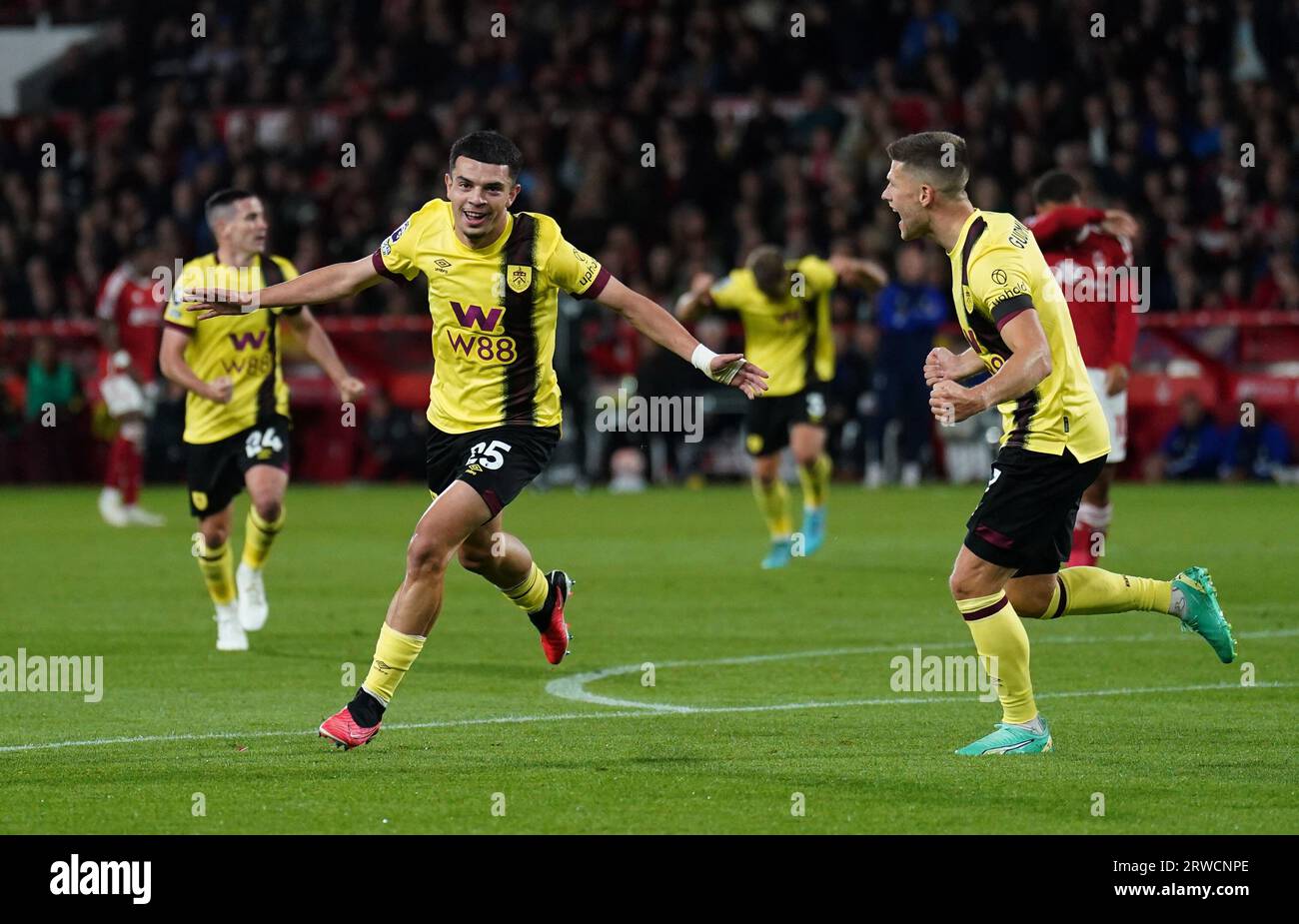 Burnley's Zeki Amdouni (left) celebrates scoring their side's first ...