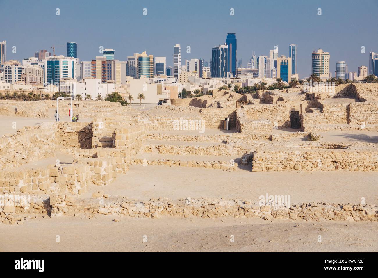 Old and new: the stone wall ruins of Bahrain Fort, dating back to 2300 ...