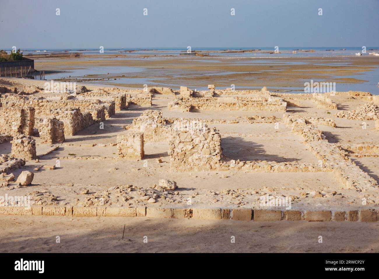 the ruins of Qal'at al-Bahrain, a fort dating back to 2300 BCE and ...