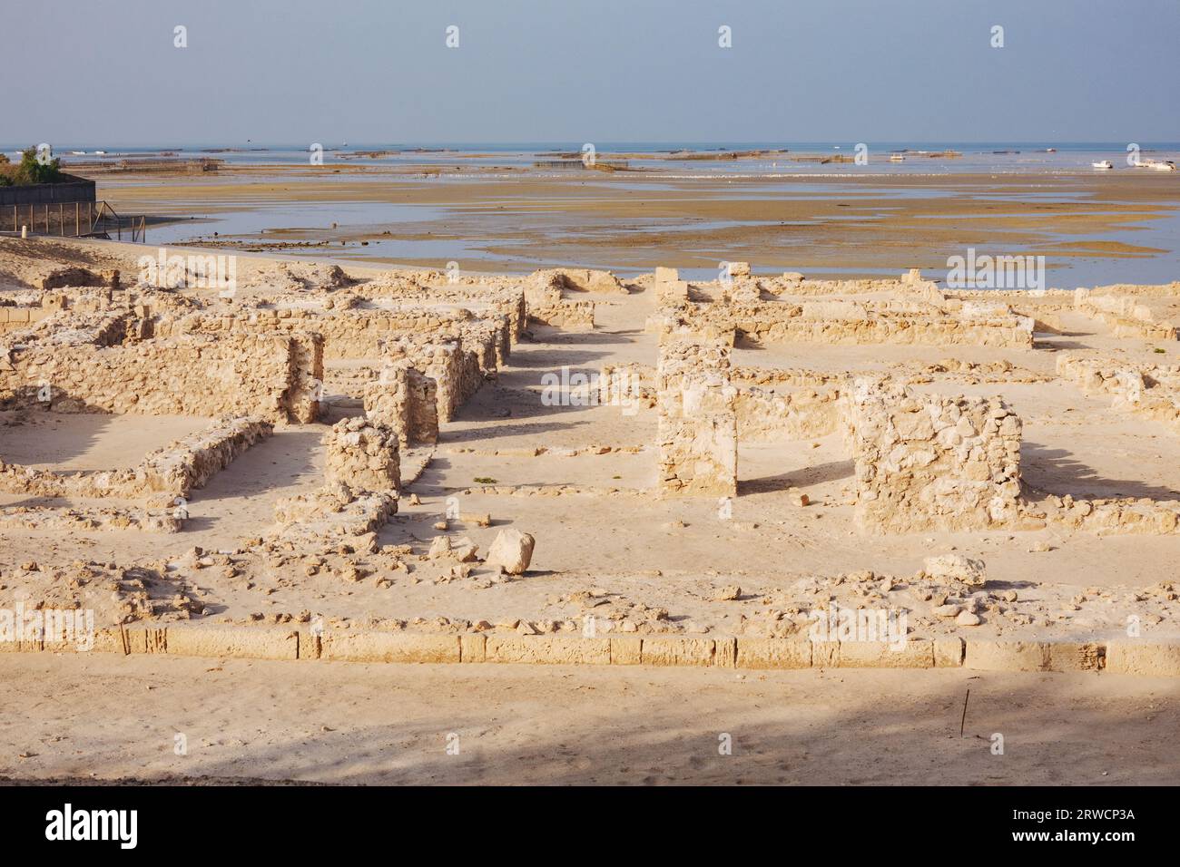the ruins of Qal'at al-Bahrain, a fort dating back to 2300 BCE and ...