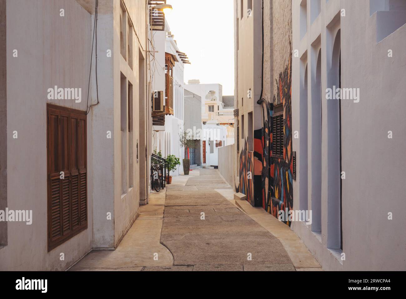 The hallmark narrow streets and white buildings of Muharraq, an ...