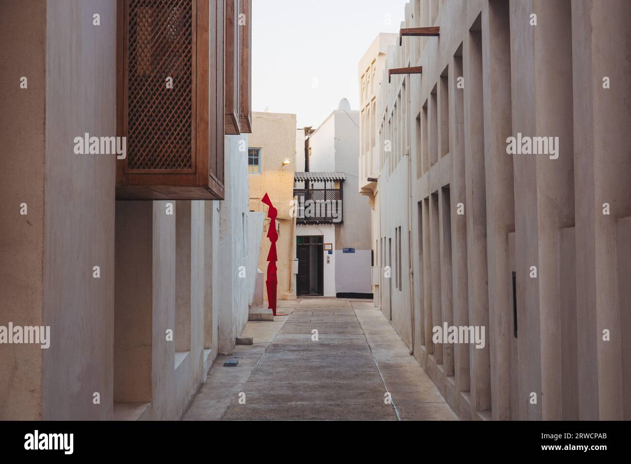 The hallmark narrow streets and white buildings of Muharraq, an ...