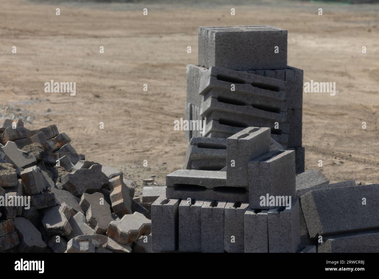 Bricks for pavement building construction grey color Stock Photo - Alamy
