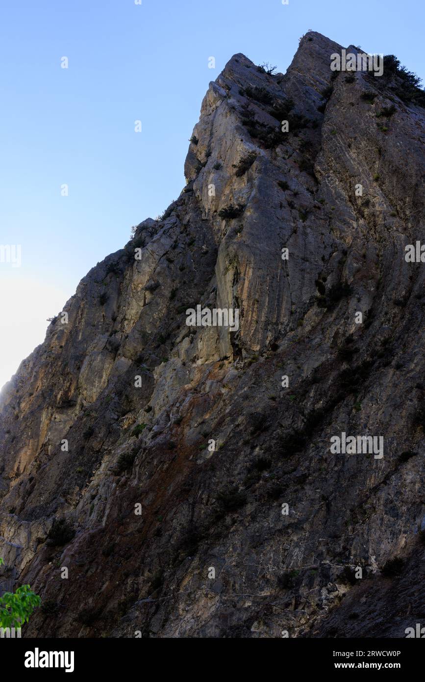 swirly granite mountain rising into the sky, rock canyon, utah Stock ...