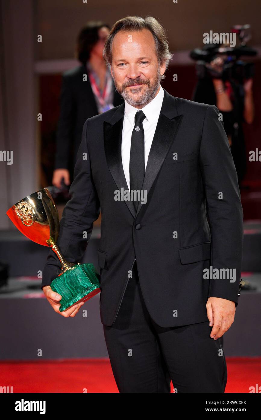 Venice, Italy. 18th Sep, 2023. Peter Sarsgaard poses with the Best ...