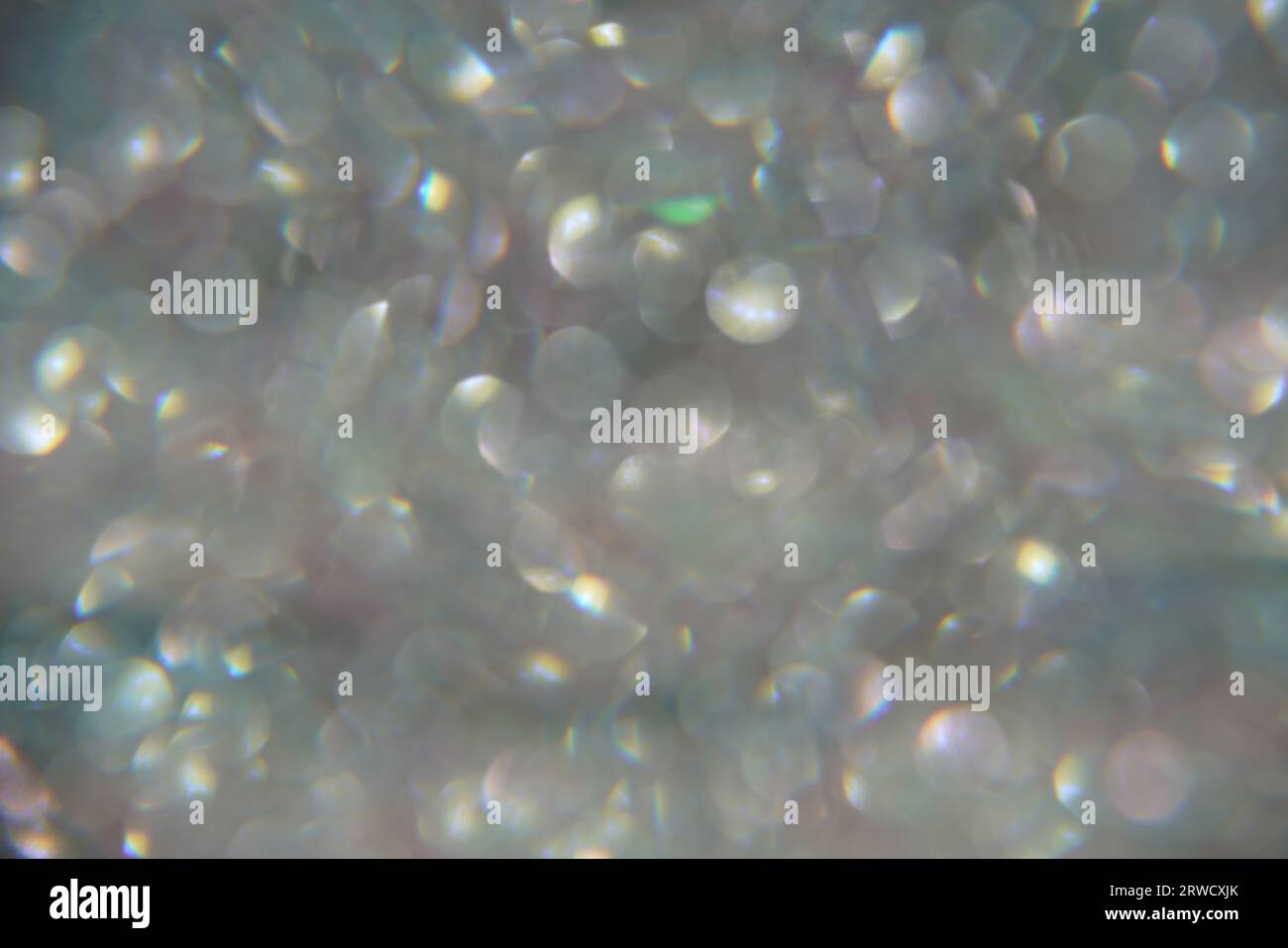 Colored photo background out of focus photographed with lens flares as ...
