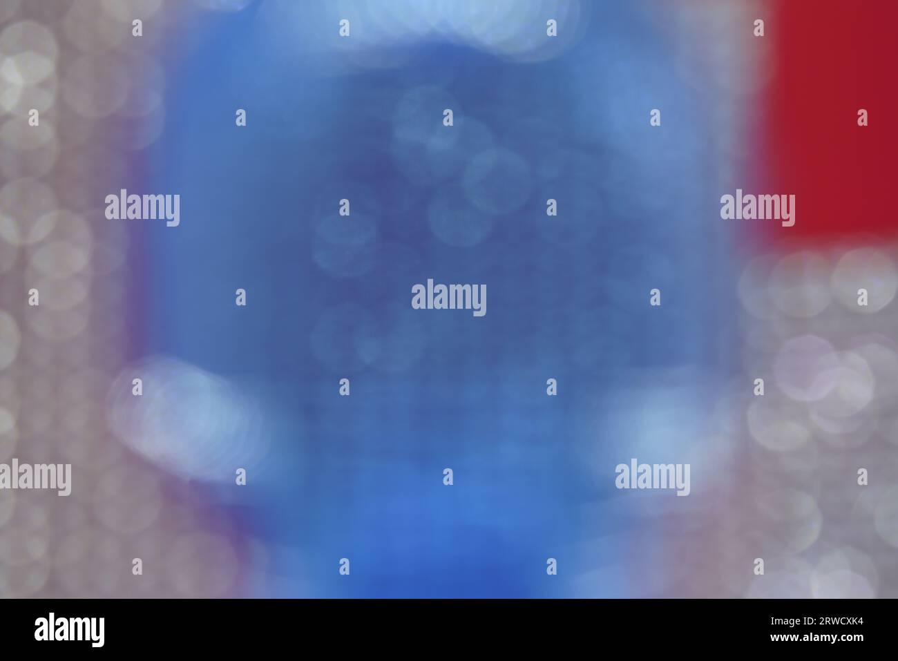 Colored photo background out of focus photographed with lens flares as ...