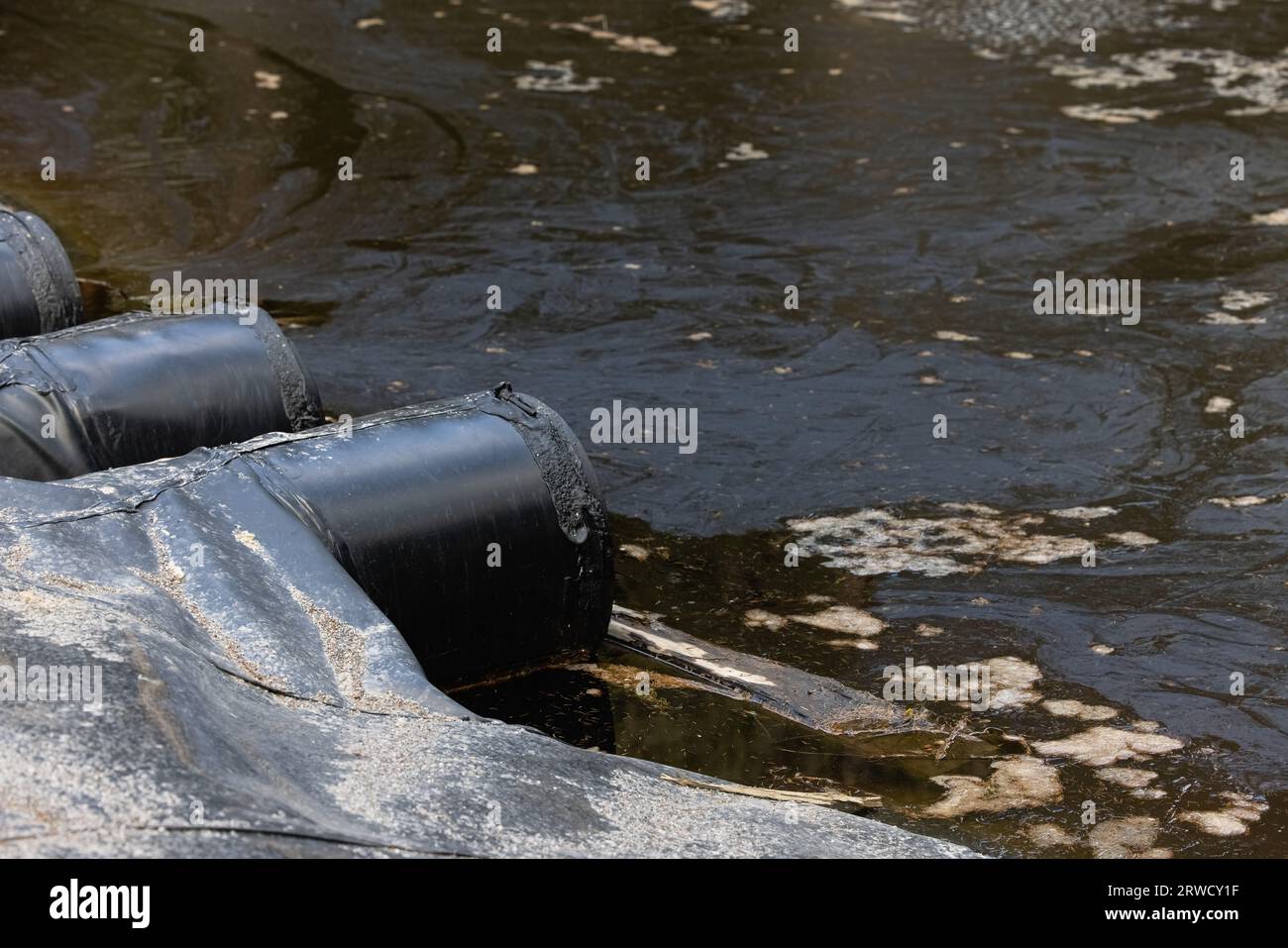 polluted water drains into the ocean. Save the environment Stock Photo ...
