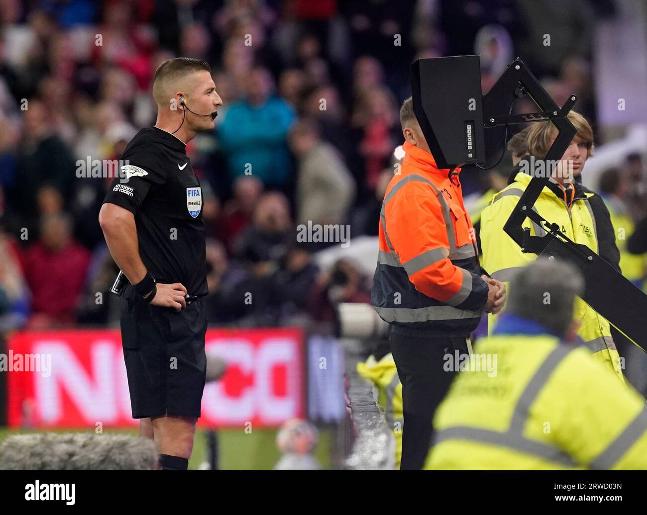 Nottingham, UK. 18th Sep, 2023. Referee Robert Jones looks at the VAR ...