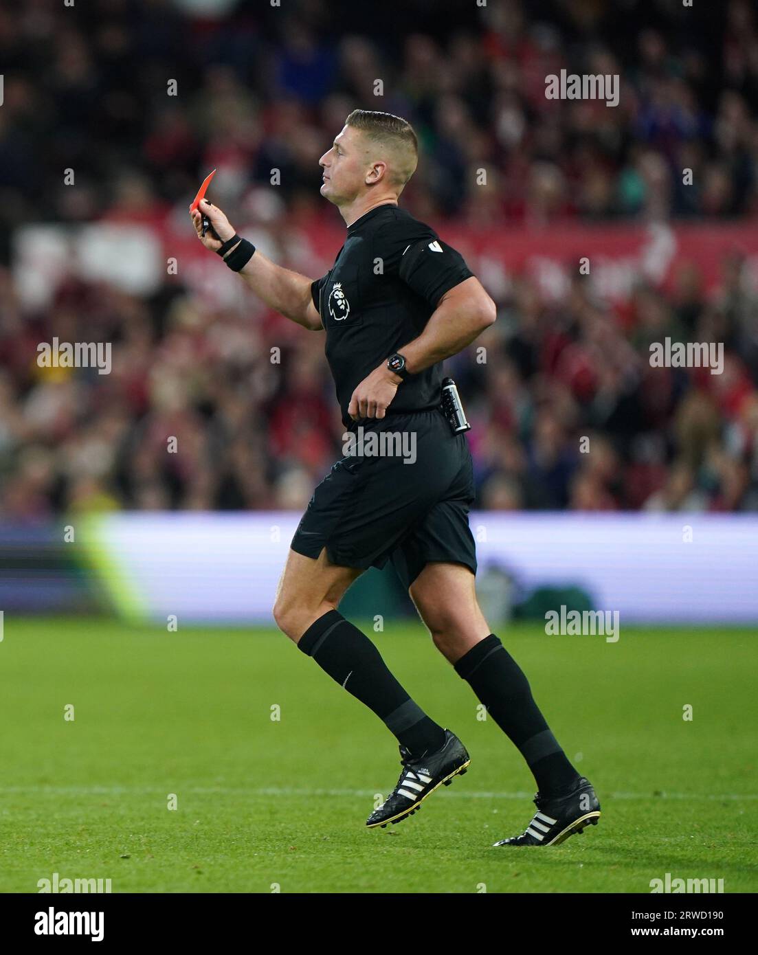 Referee Robert Jones shows a red card to Burnley's Lyle Foster (not ...