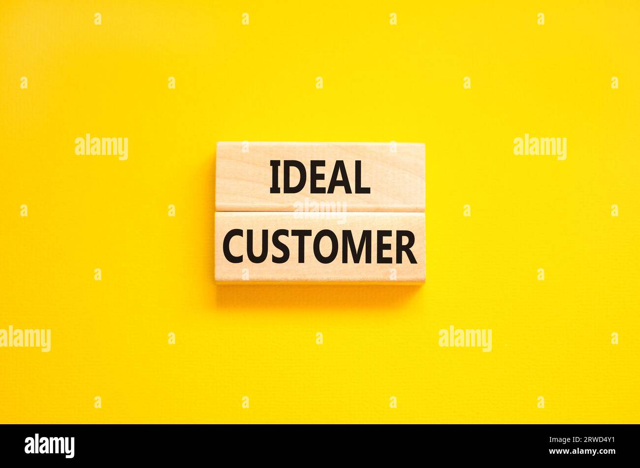 Ideal customer symbol. Concept words Ideal customer on beautiful wooden ...
