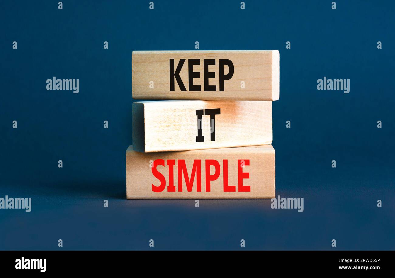 Keep it simple symbol. Concept word Keep it simple on beautiful wooden ...