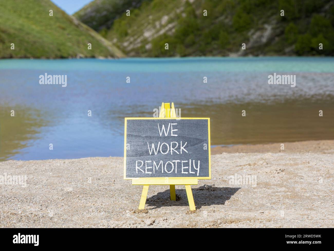 We work remotely symbol. Concept words We work remotely on beautiful ...
