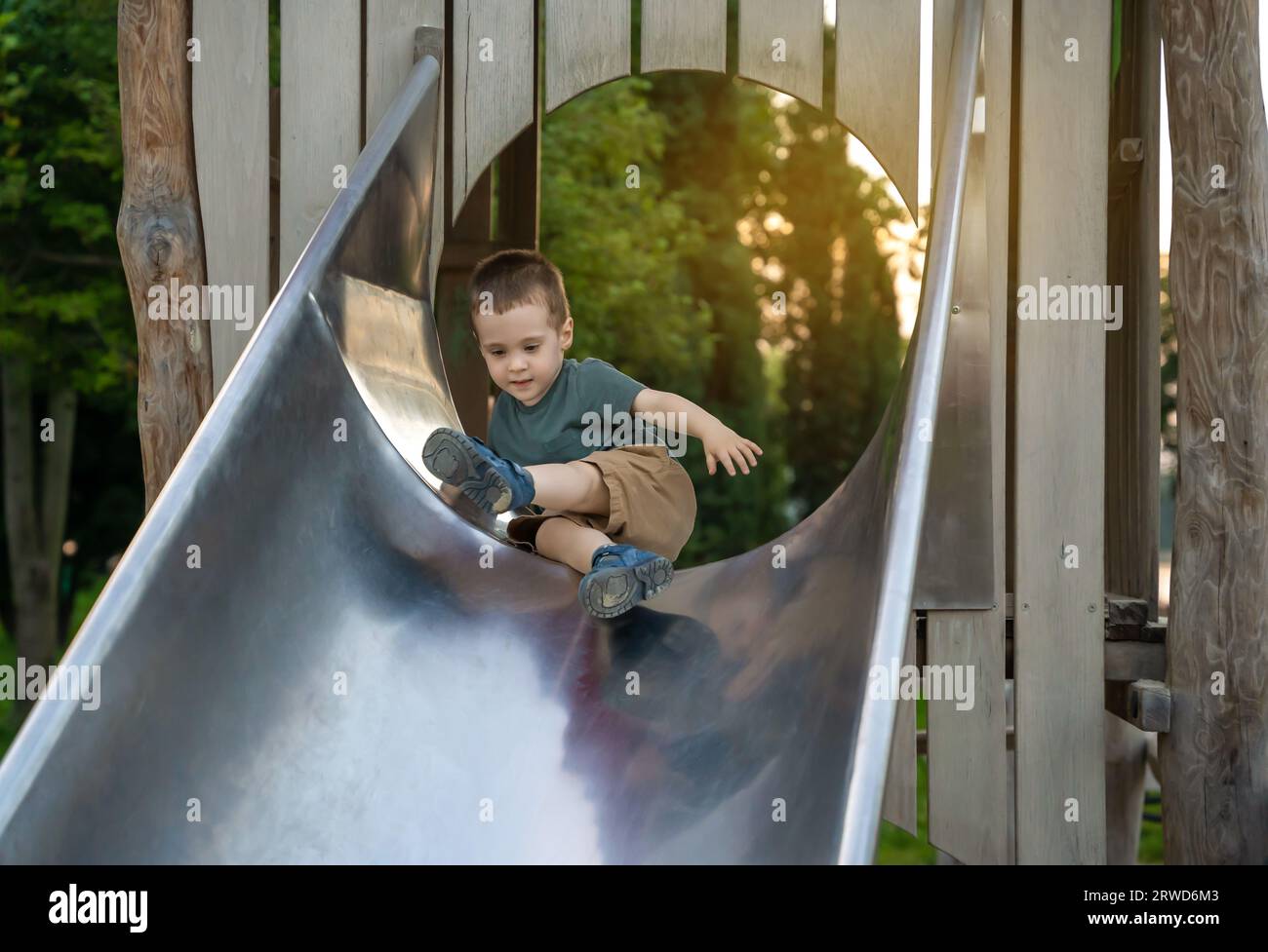 Going down the slide hi-res stock photography and images - Alamy