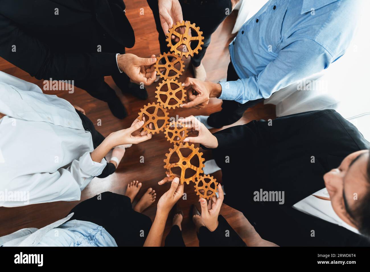 Teamwork collaboration unity corporate gear hi-res stock photography ...