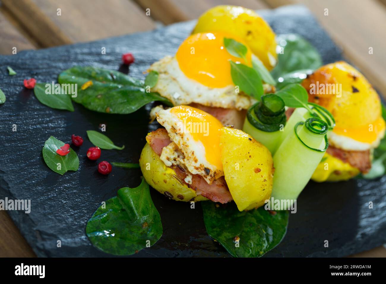 Potato burgers with quail egg Stock Photo - Alamy