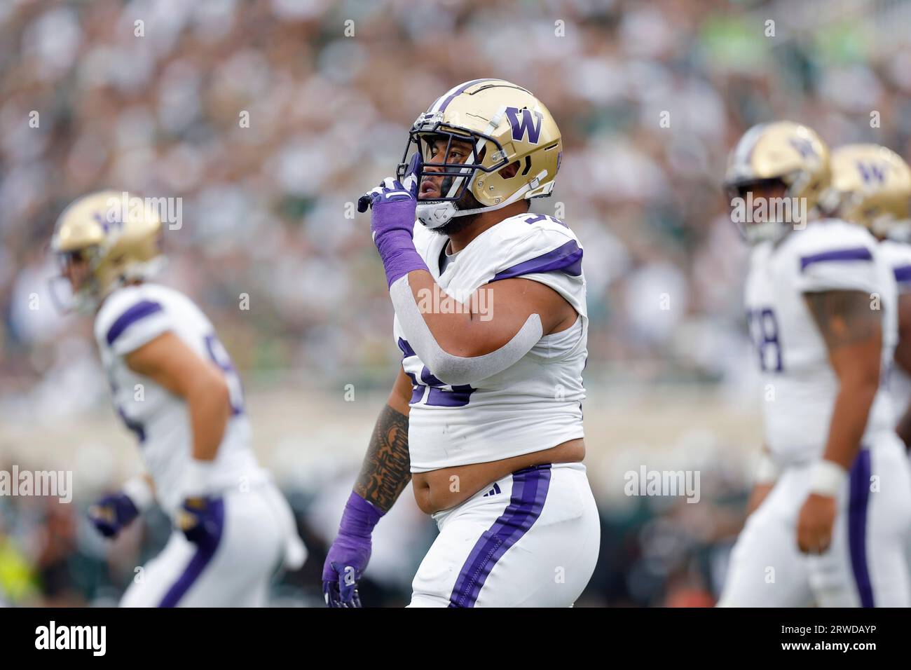 Washington offensive lineman Troy Fautanu celebrates a touchdown during ...