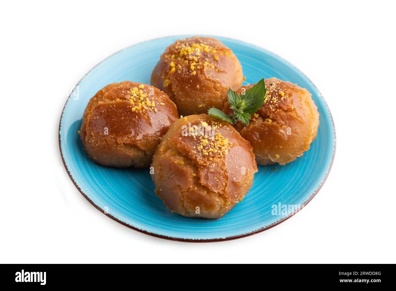 Homemade traditional turkish dessert sekerpare with almonds and honey ...