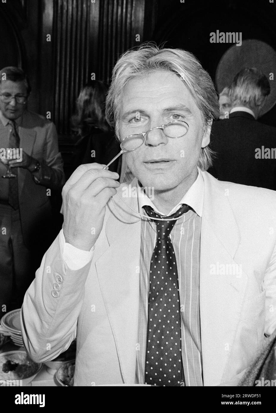 LONDON, UK. September 18, 1986: Actor & singer Adam Faith at a party in ...