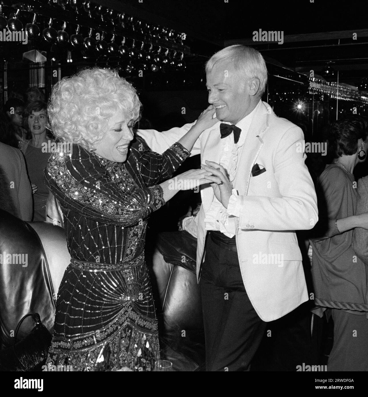 LONDON, UK. October 19, 1986: Barbara Windsor & John Inman at a party ...